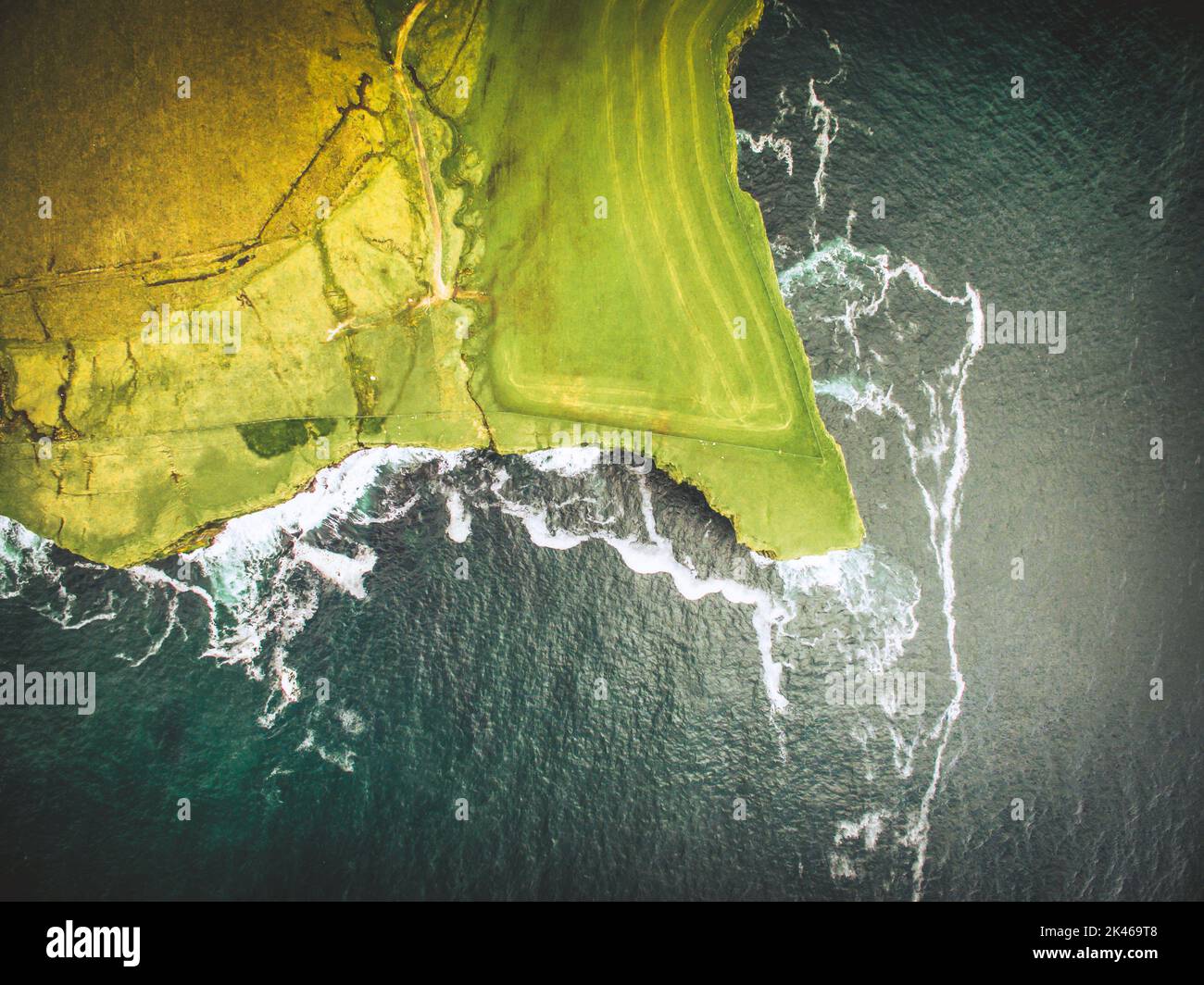 Dramatic aerial top down view scenic green cliffs with agriculture ...