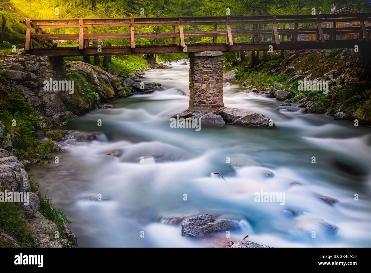 Footbridge river alps italy hi-res stock photography and images - Alamy