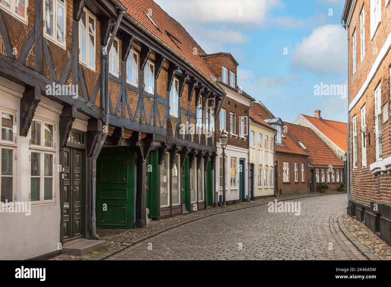 Street and traditional houses in old town of Ribe, Jutland, Denmark ...
