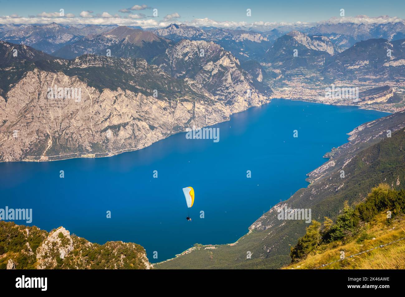 Paragliding above idyllic Lake Garda from Monte Baldo, Malcesine, Italy ...