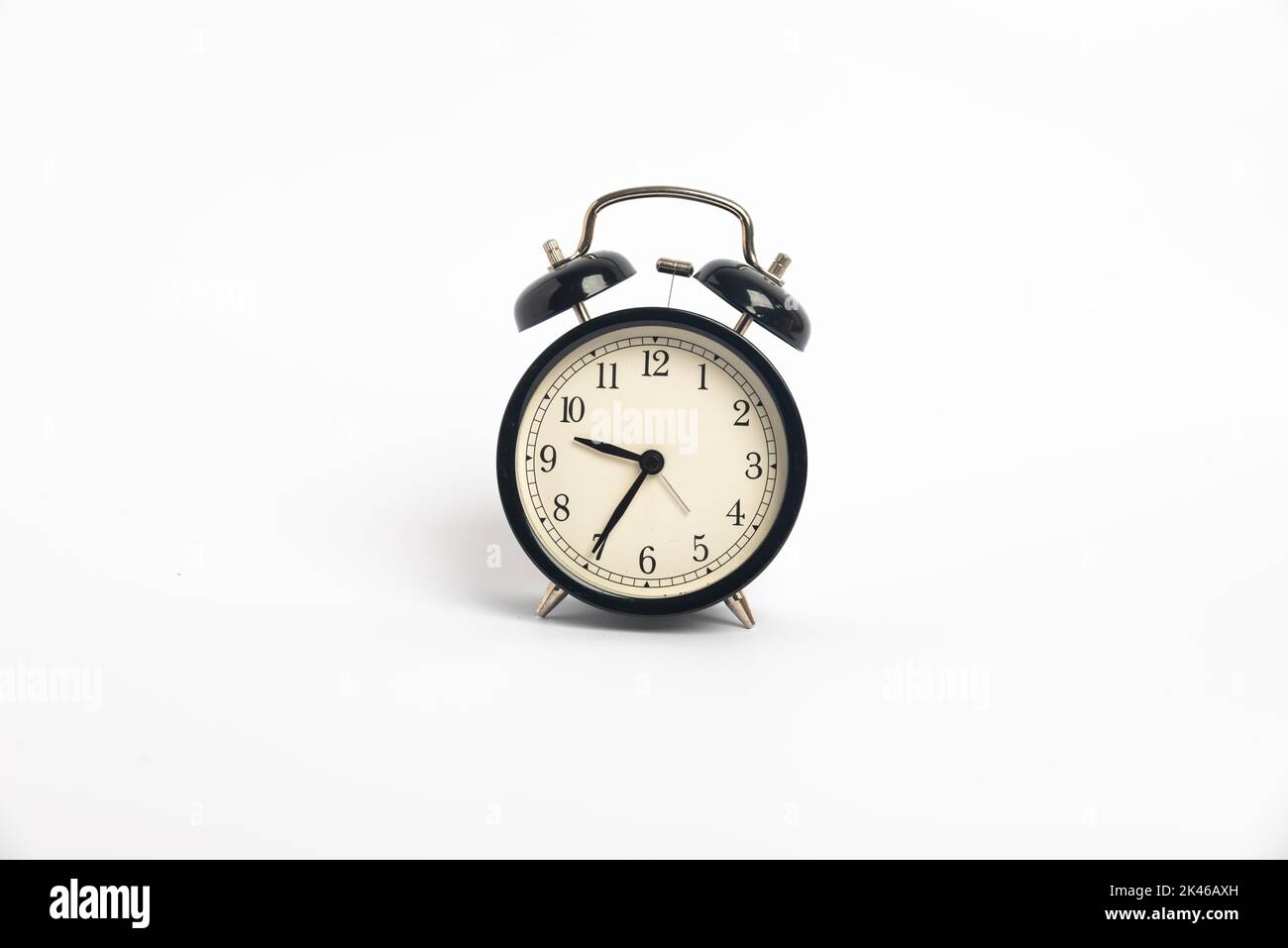 black vintage alarm clock isolated on white background, Time concept, 9 ...