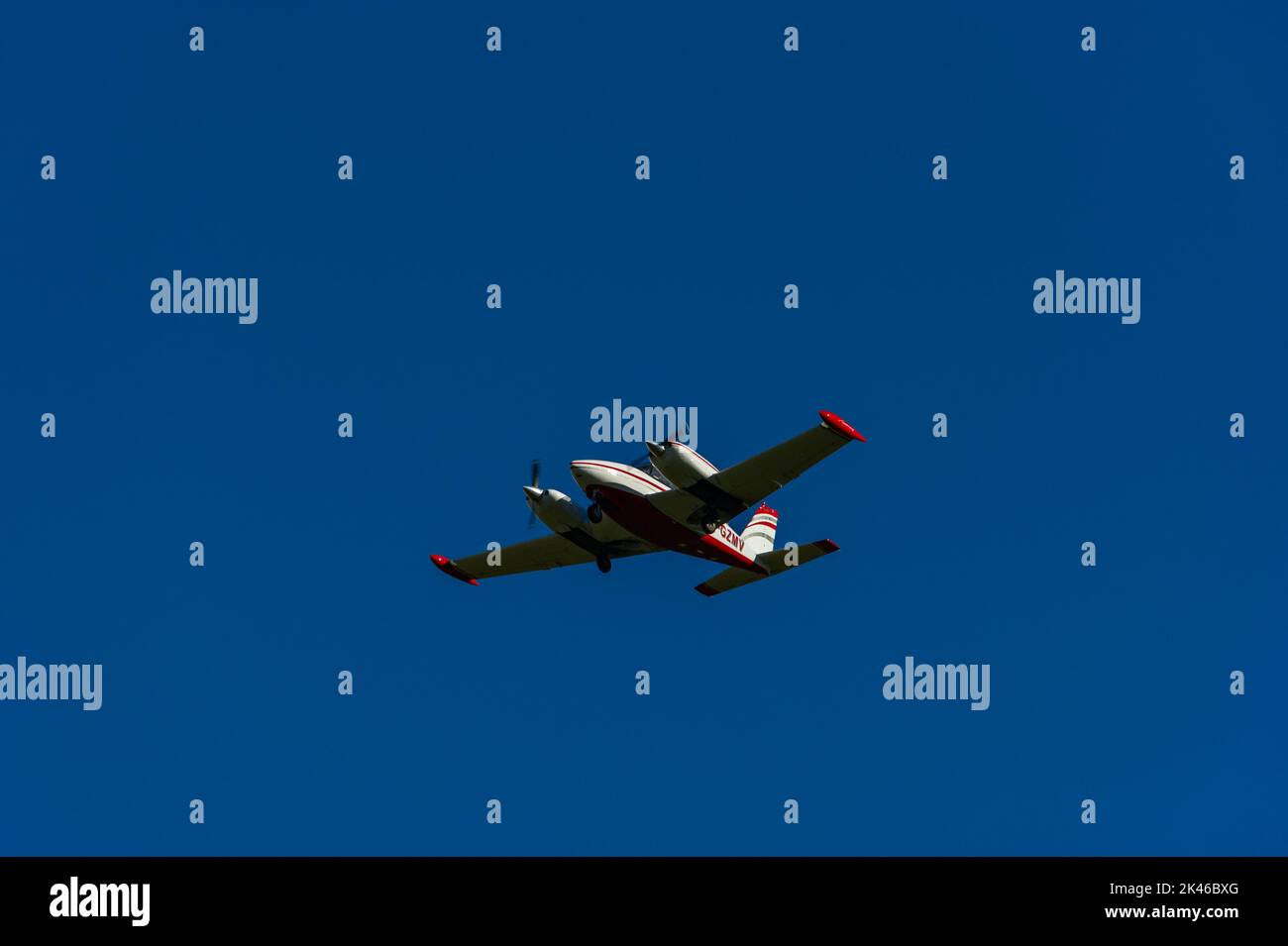 Piper, PA-30 in flight, bottom view Stock Photo - Alamy