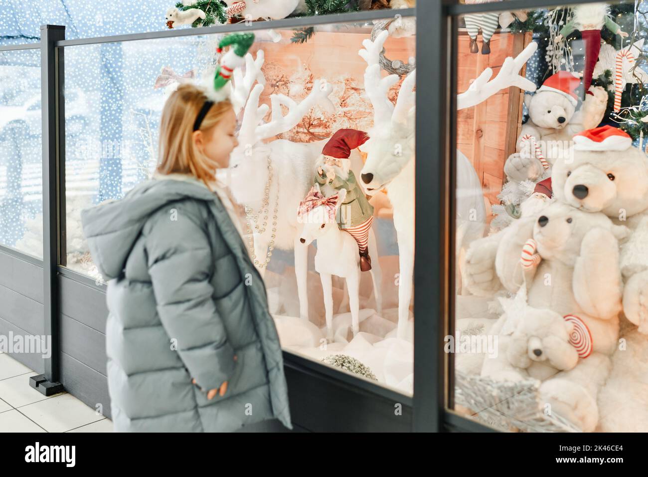 Child looking toy shop window hi-res stock photography and images - Alamy