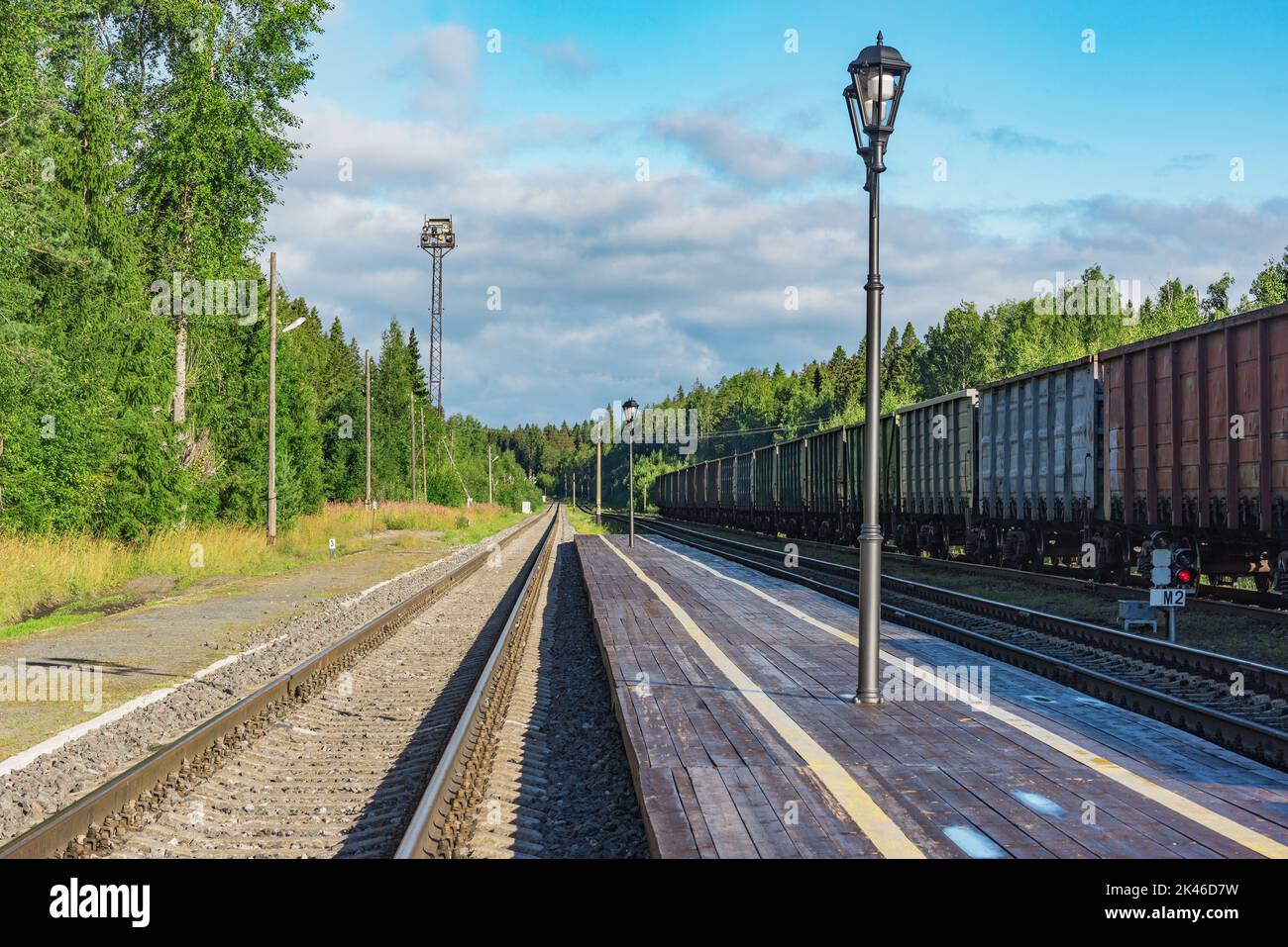 Railway platform and tracks of the station Stock Photo - Alamy