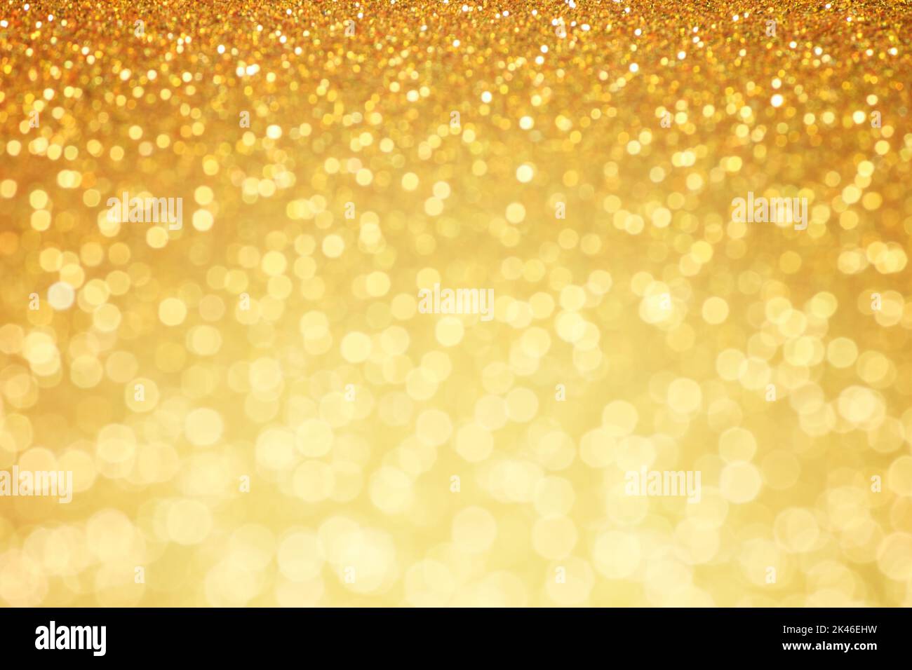 Golden glittering background. Sparkle glitter texture with the bokeh ...