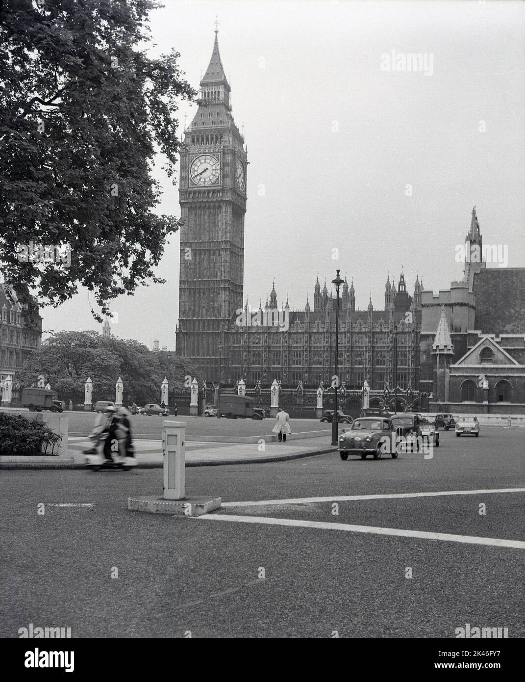 1958, historical, view from this era of cars on the road junction at ...