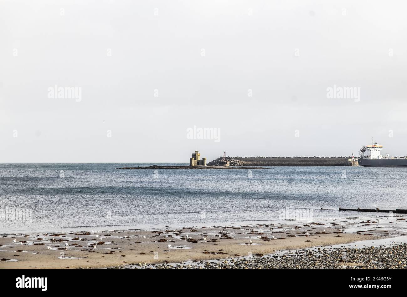 Douglas Bay beach in the Isle of Man with St Mary's Isle Tower of ...