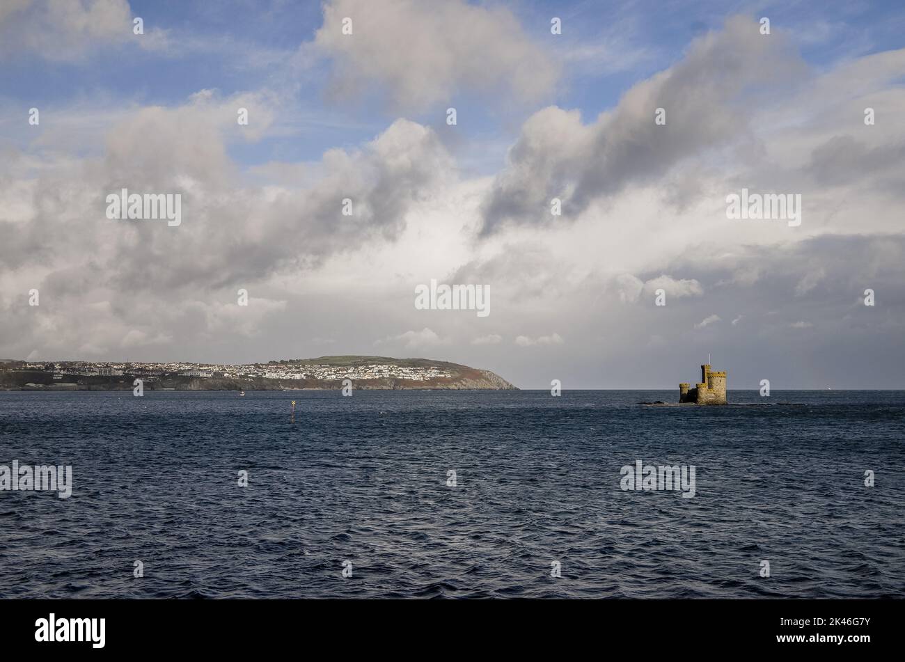 A long distant view of Douglas city in Isle of Man with ancient St Mary ...