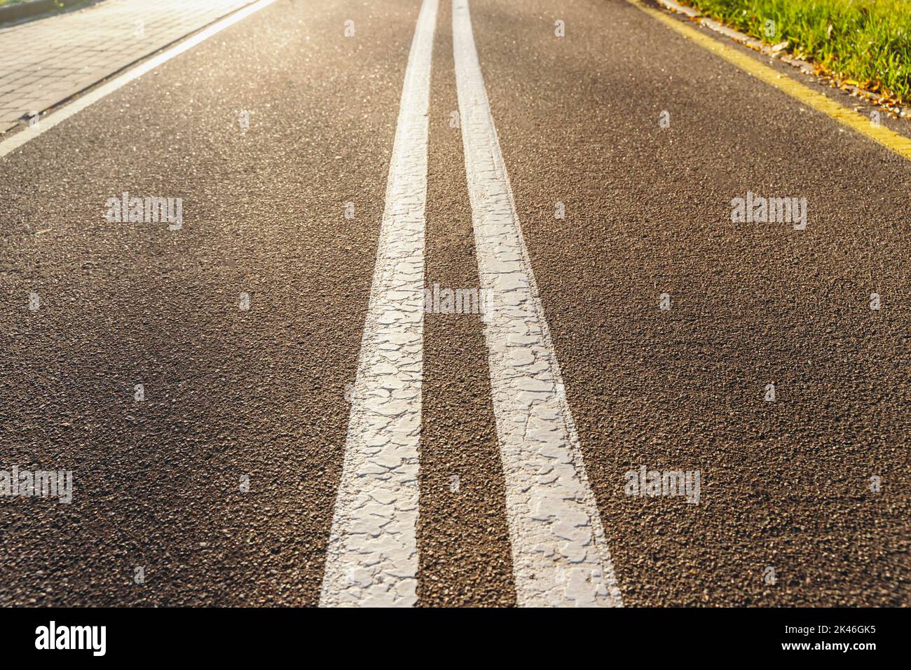 Highway with asphalt surface in summer sunset. Travel, path, road, car ...