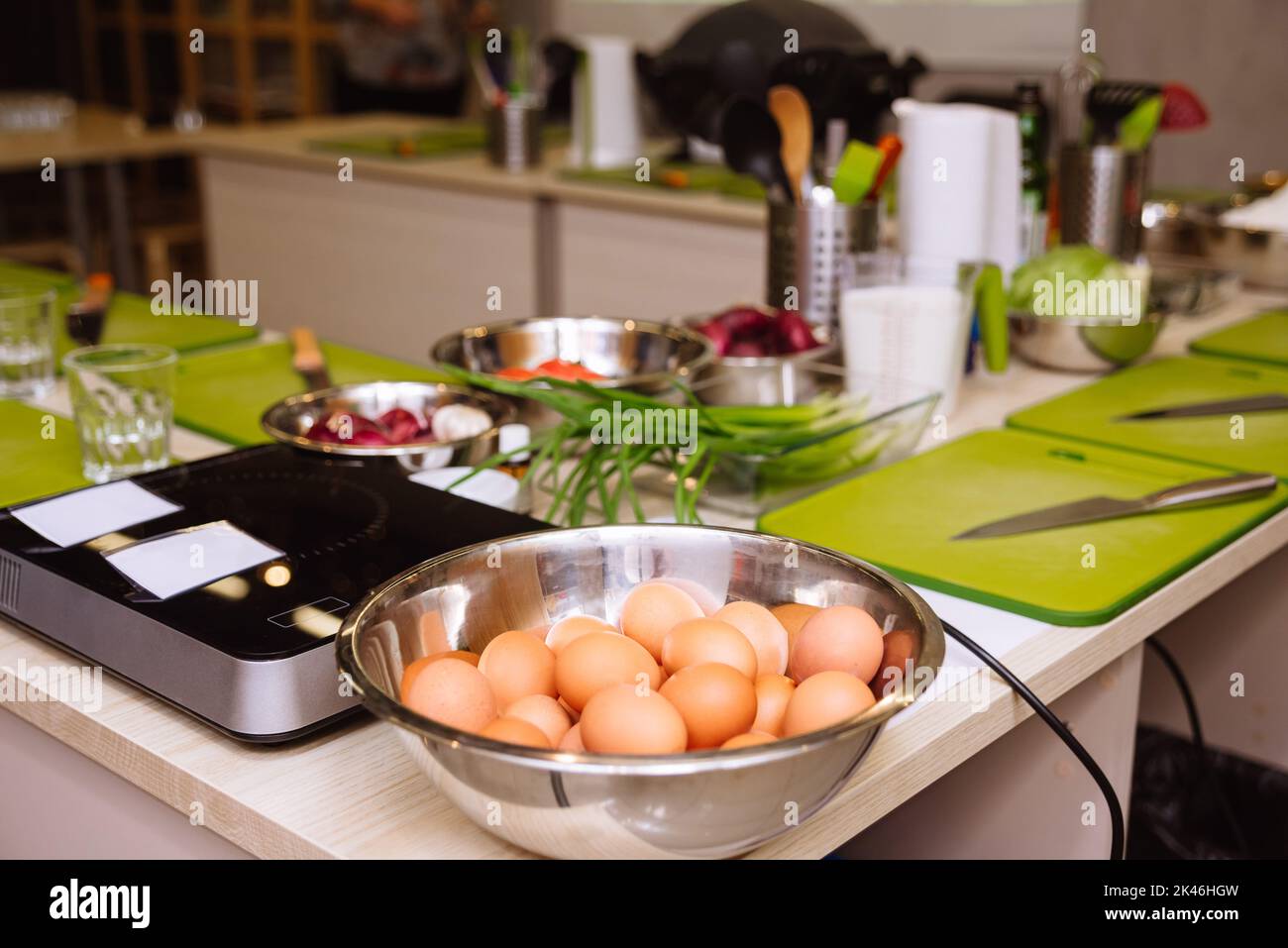 Cooking tables (working stations) prepared before the cooking master ...