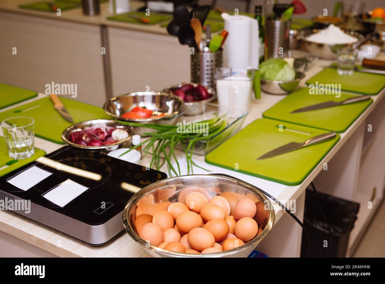 Cooking tables (working stations) prepared before the cooking master ...