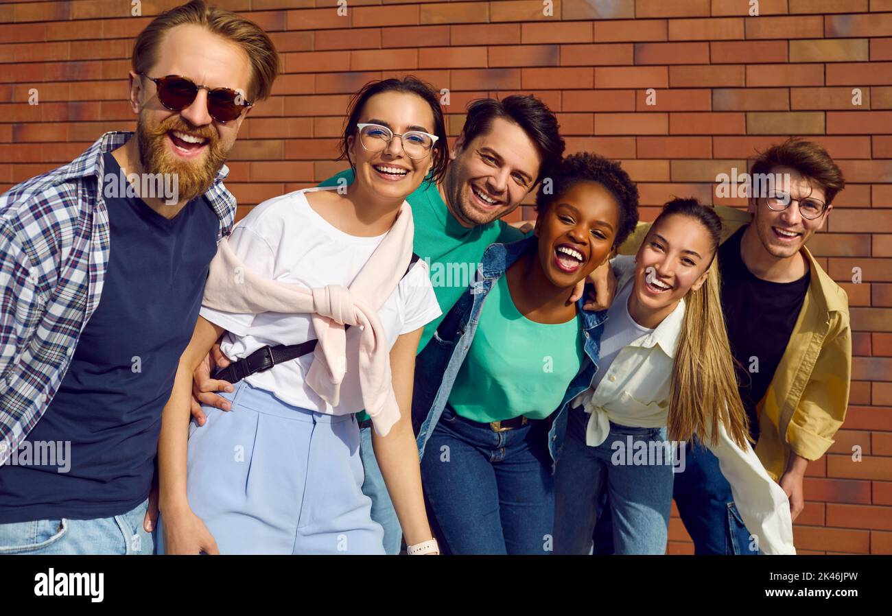 Portrait of carefree, stylish, fun and friendly multiracial people ...