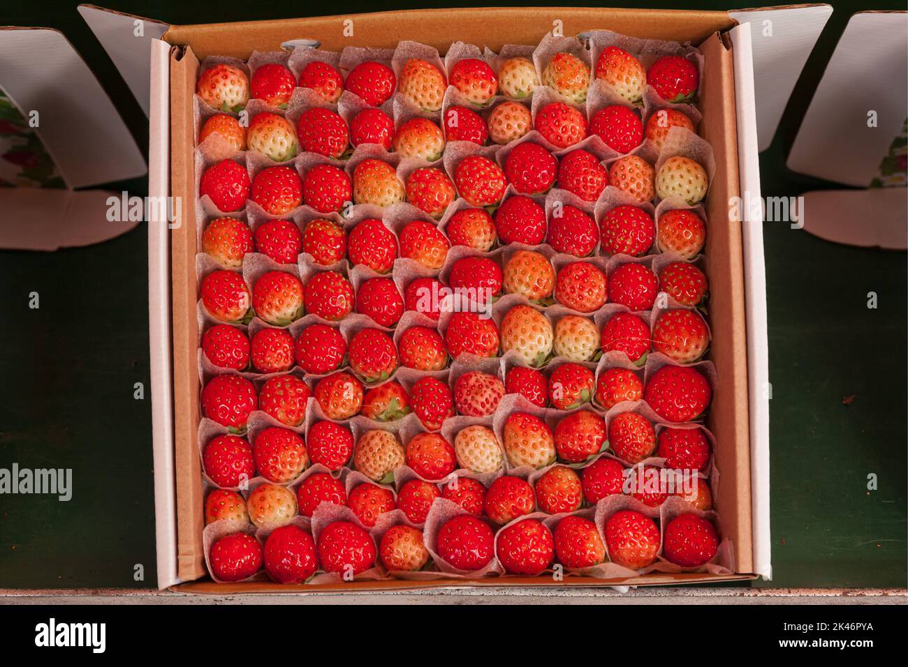 Baby with strawberries hi-res stock photography and images - Alamy
