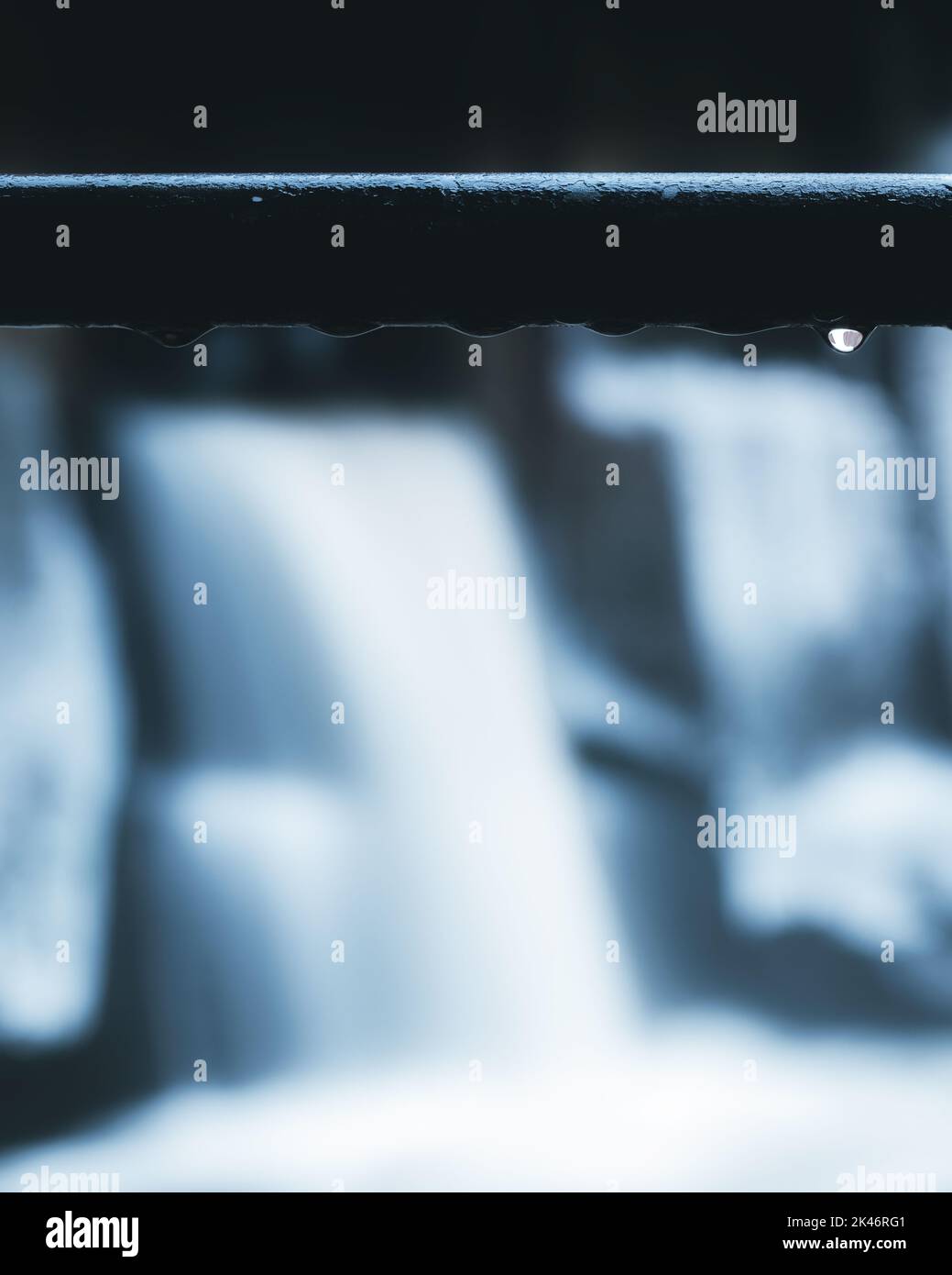 Water drop in front of waterfall Stock Photo - Alamy