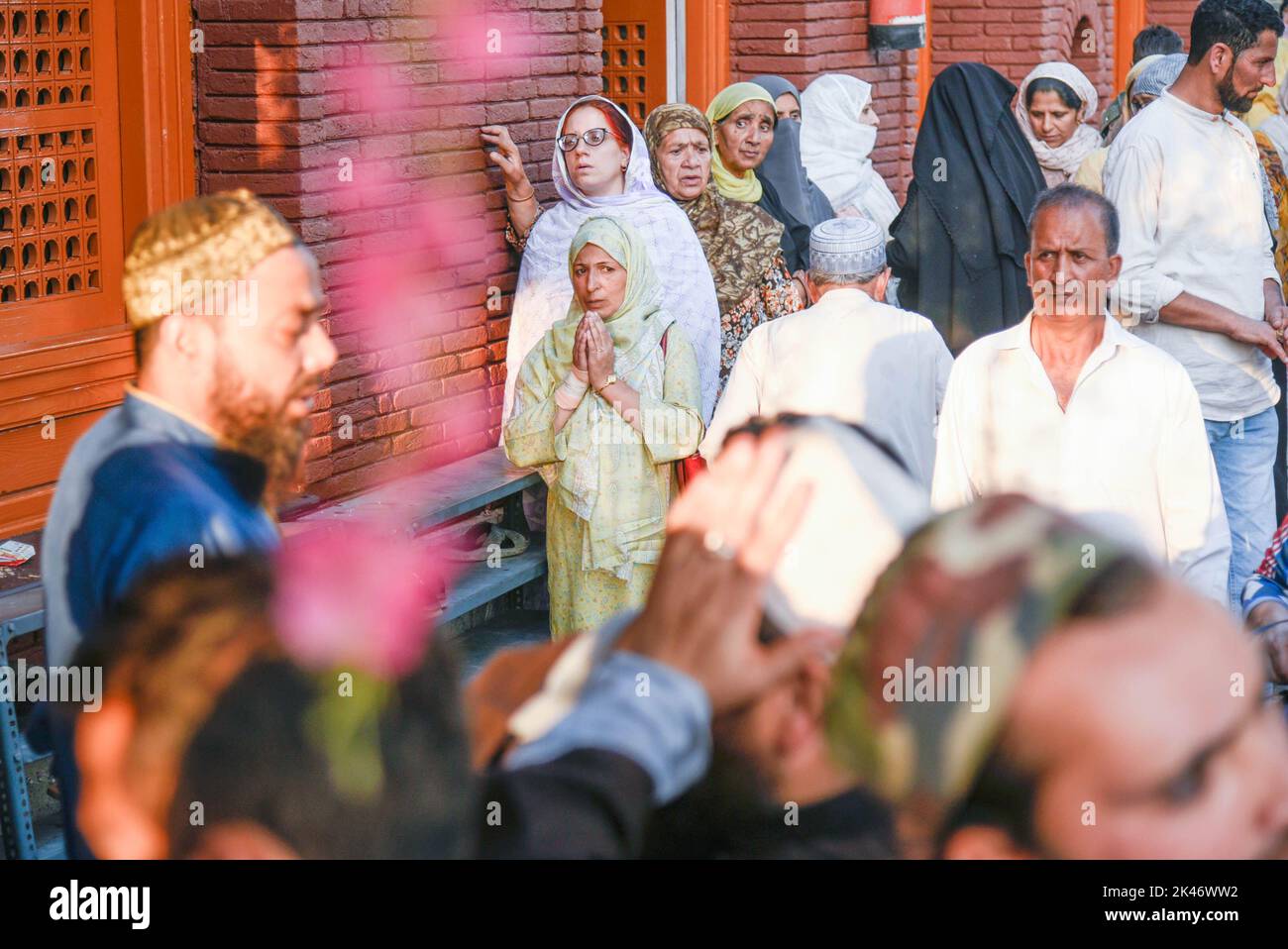 Muslim devotees pray outside Sufi shrine in Srinagar. Thousands of ...