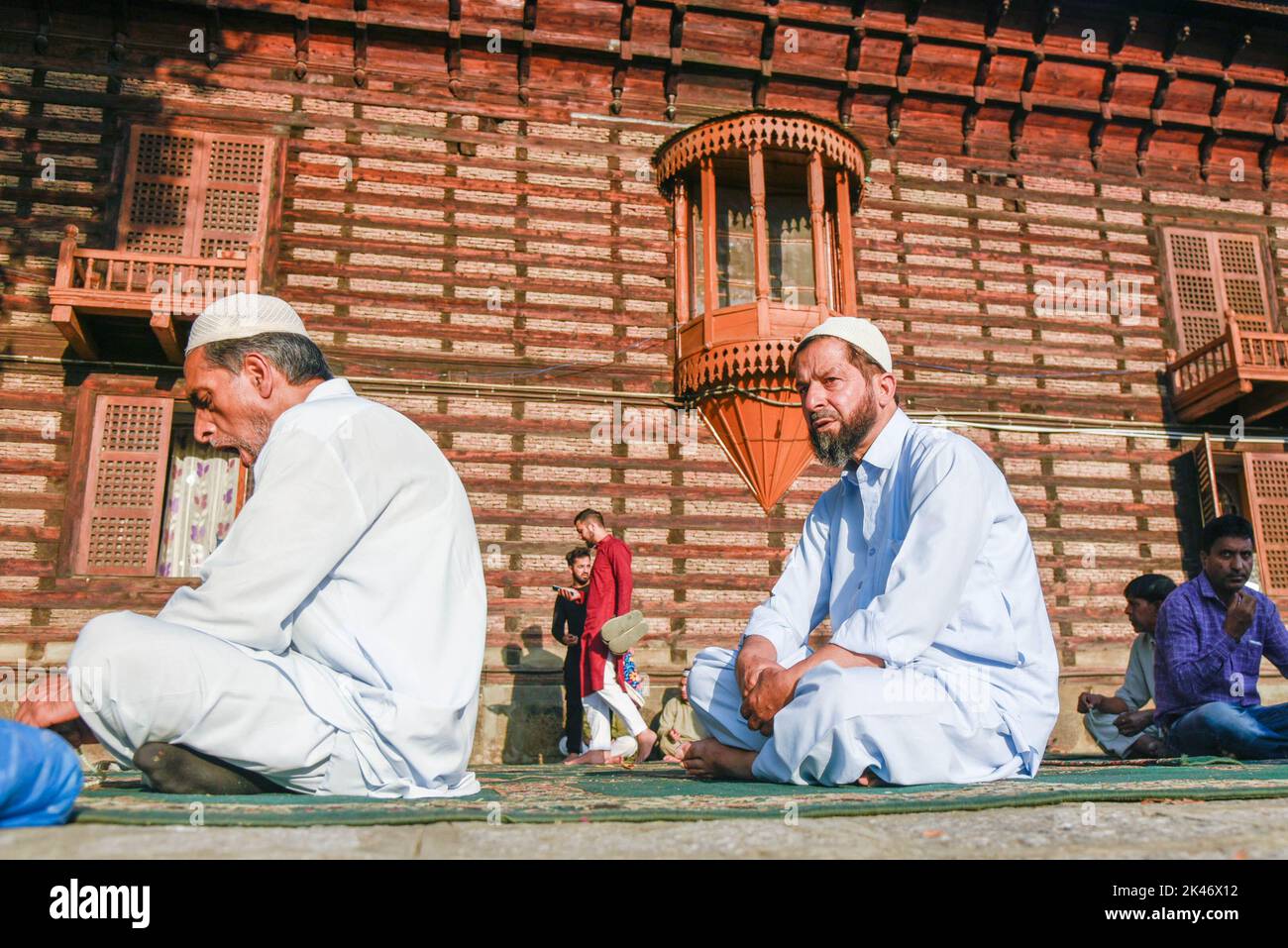 Srinagar, India. 30th Sep, 2022. Muslim devotees pray outside Sufi ...