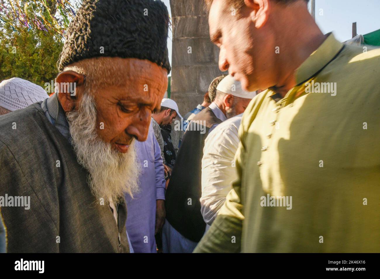 Muslim devotees enter and leave from Sufi Shrine in Srinagar. Thousands ...