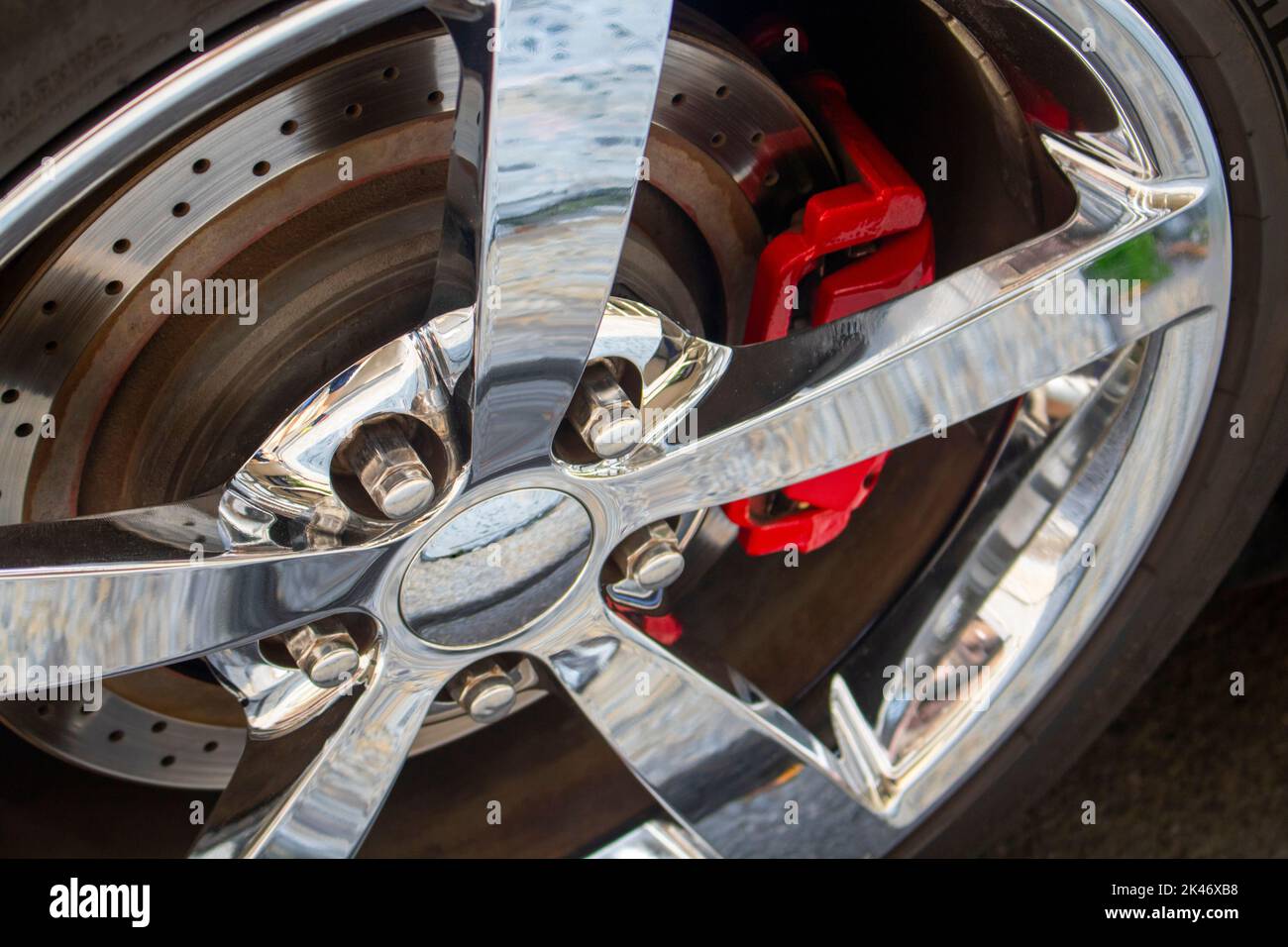 sports car chrome shinny wheel base with black tire, rim red break pad ...