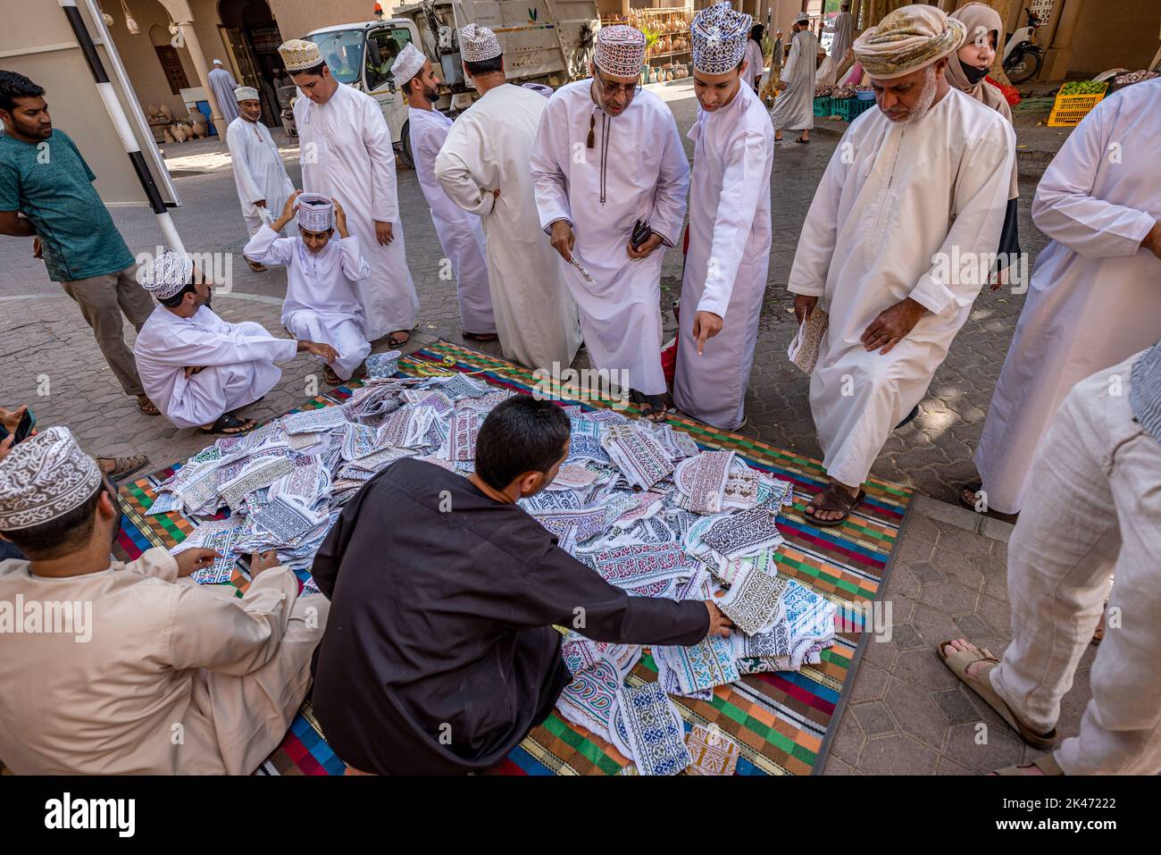 Outdoor seller of kuma (Omani traditional round hat, in Nizwa, Oman ...