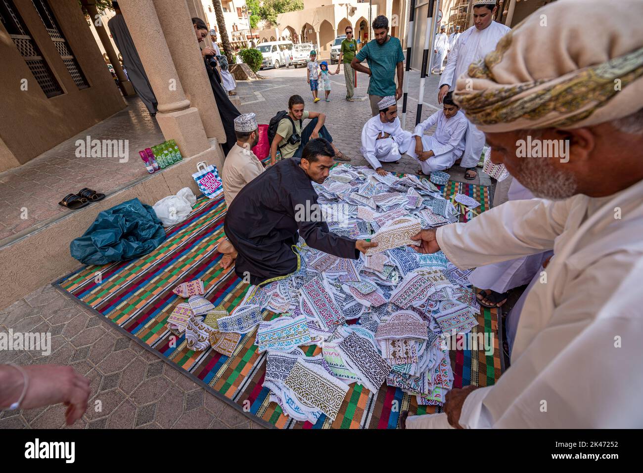 Outdoor seller of kuma (Omani traditional round hat, in Nizwa, Oman ...