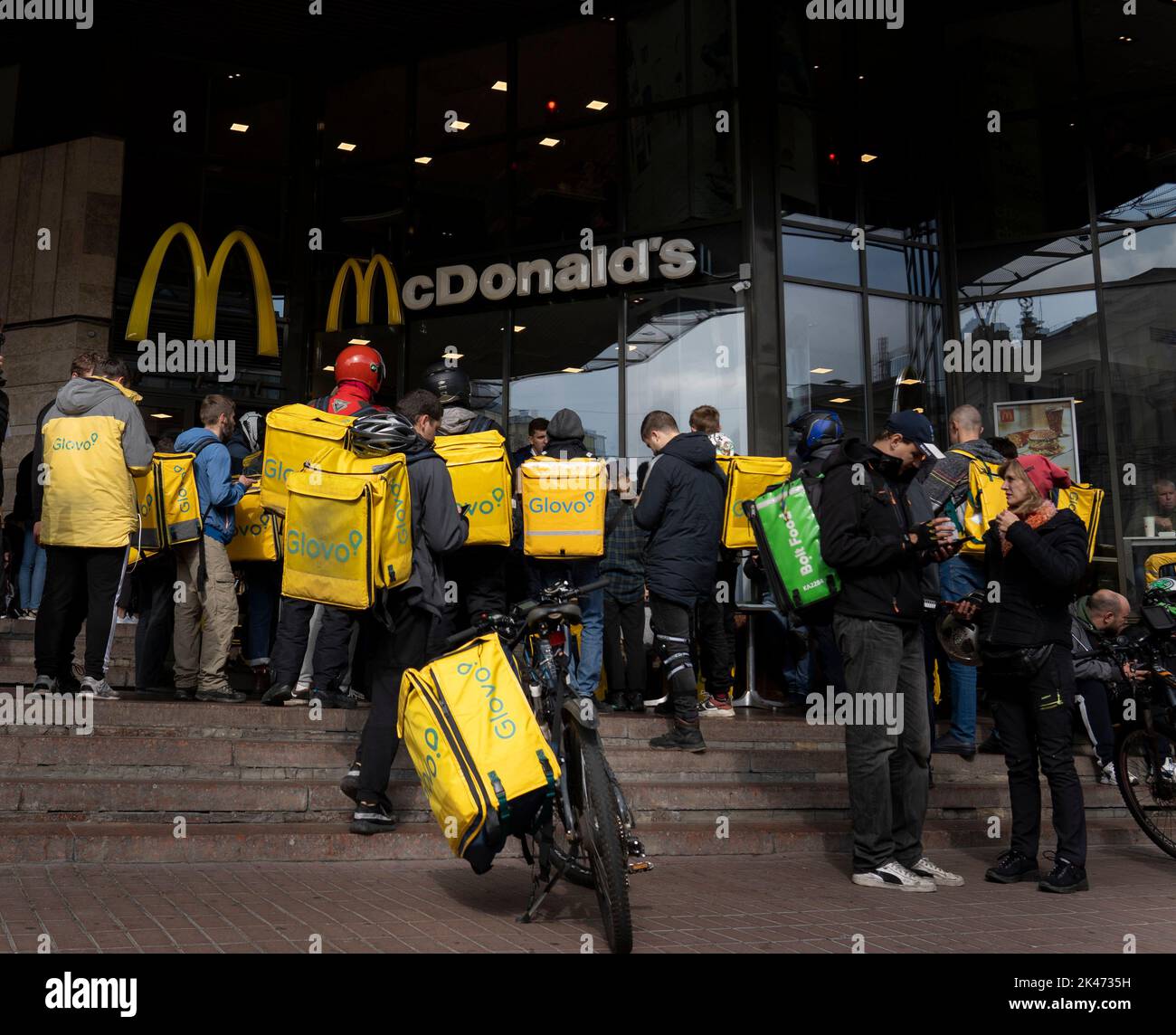 Kyiv, Ukraine. 30th Sep, 2022. A group of delivery men seen queuing ...