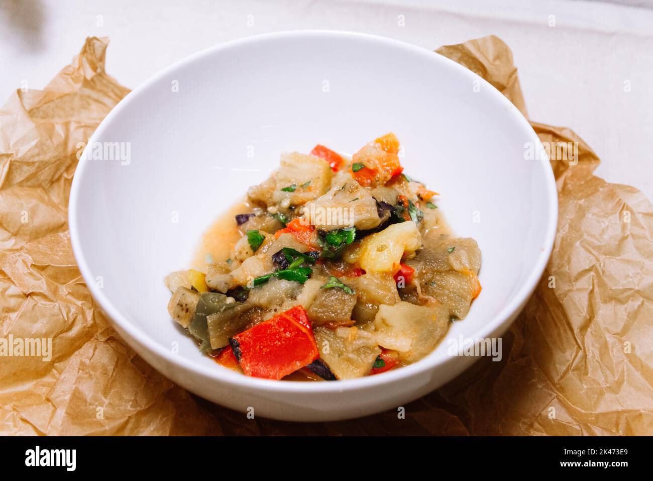 Eggplant stew with vegetables. Large cubes of stewed vegetables in a ...