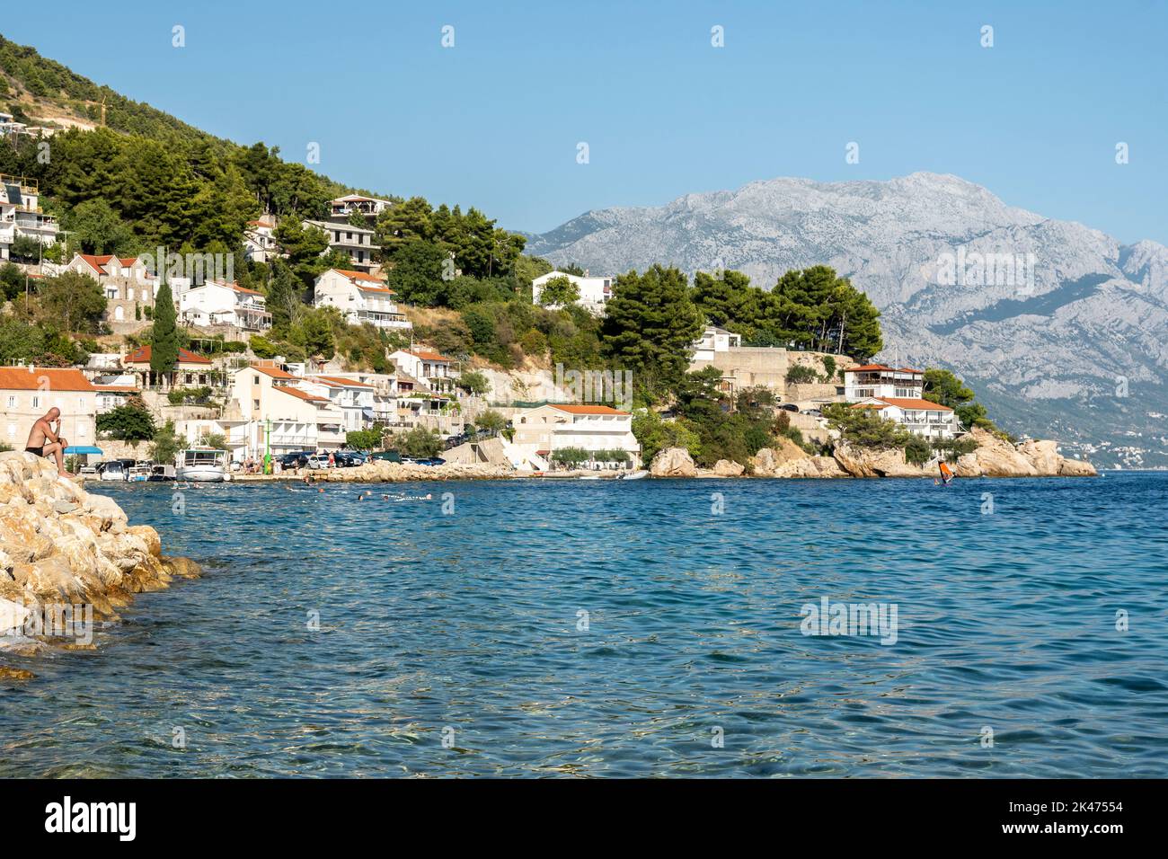 Mimice, Croatia-August 16th, 2022: Houses built on the steep slope of ...