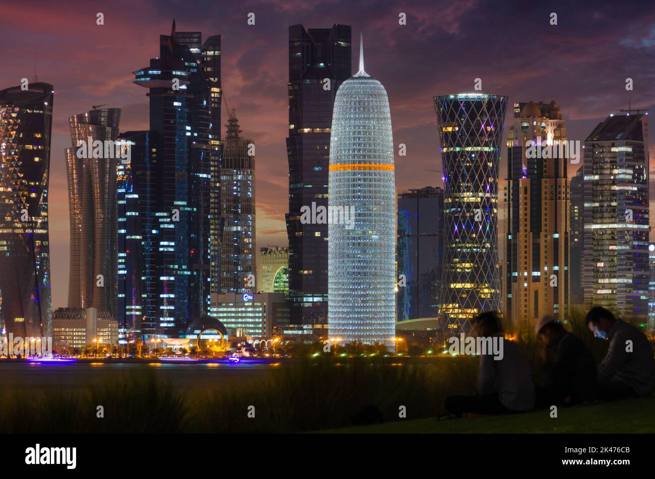 Doha city skyline illuminated at night. Qatar, Middle East Stock Photo ...