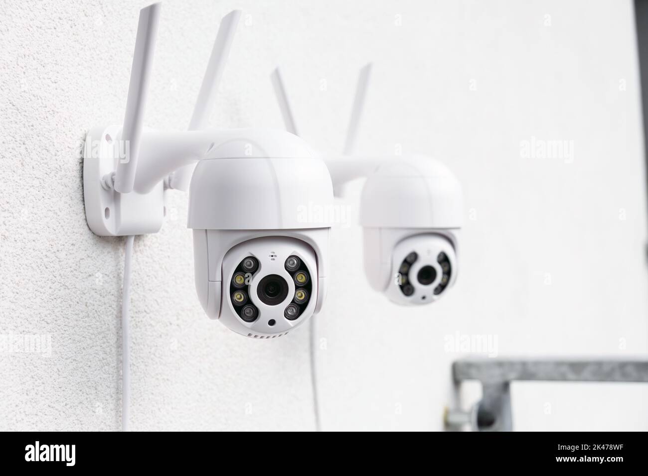 Surveillance cameras hanging on the wall for security and safety office ...