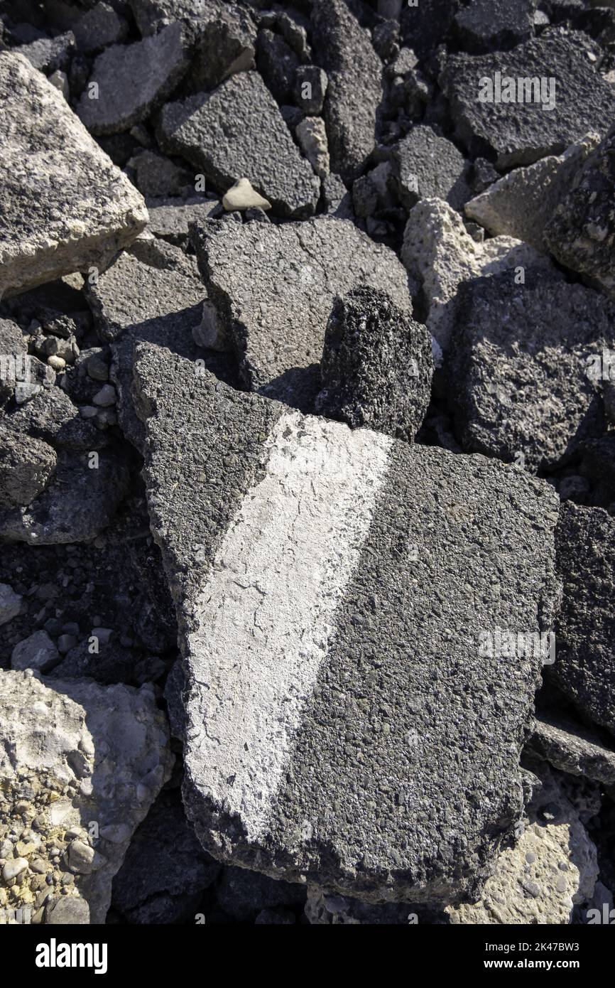 Pieces of road broken by destruction, traffic reform, construction ...