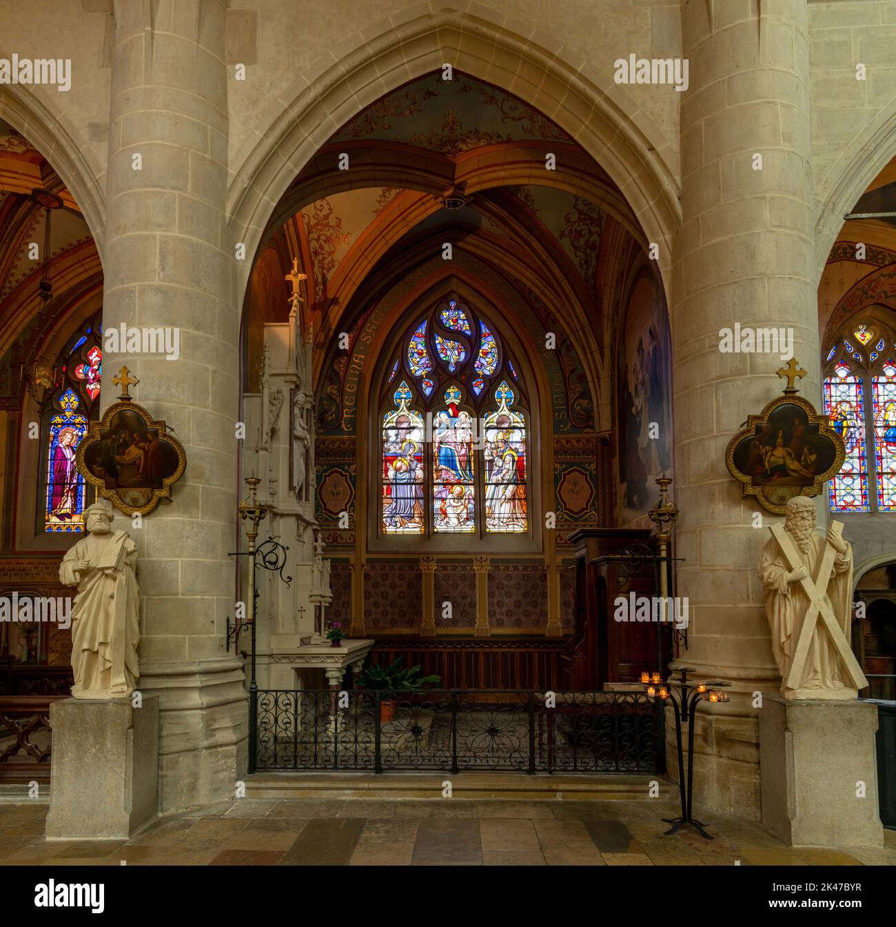 Dole, France - 14 September, 2022: view of the altar and stained glass ...