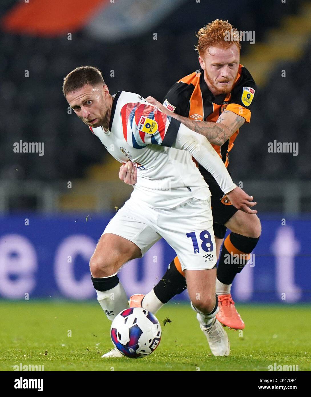 Luton Town's Jordan Clark (left) and Hull City's Ryan Woods battle for ...