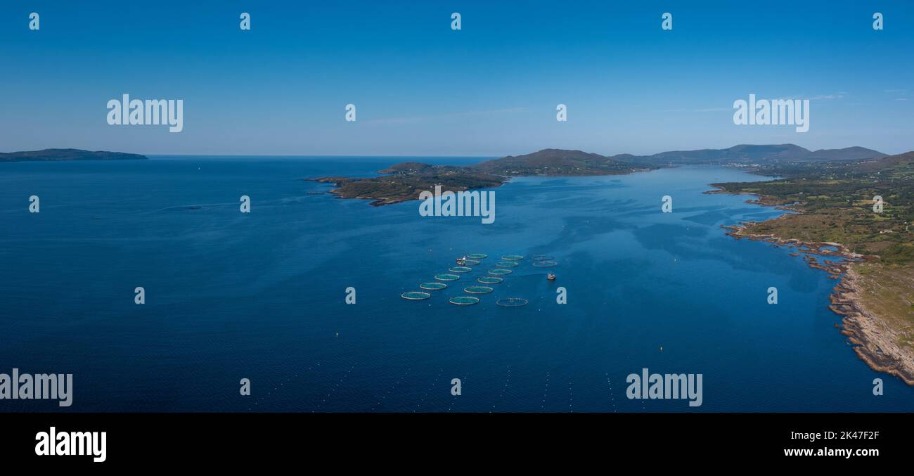 An aerial view of a salmon fish farm in Bantry Bay in County Cork of ...
