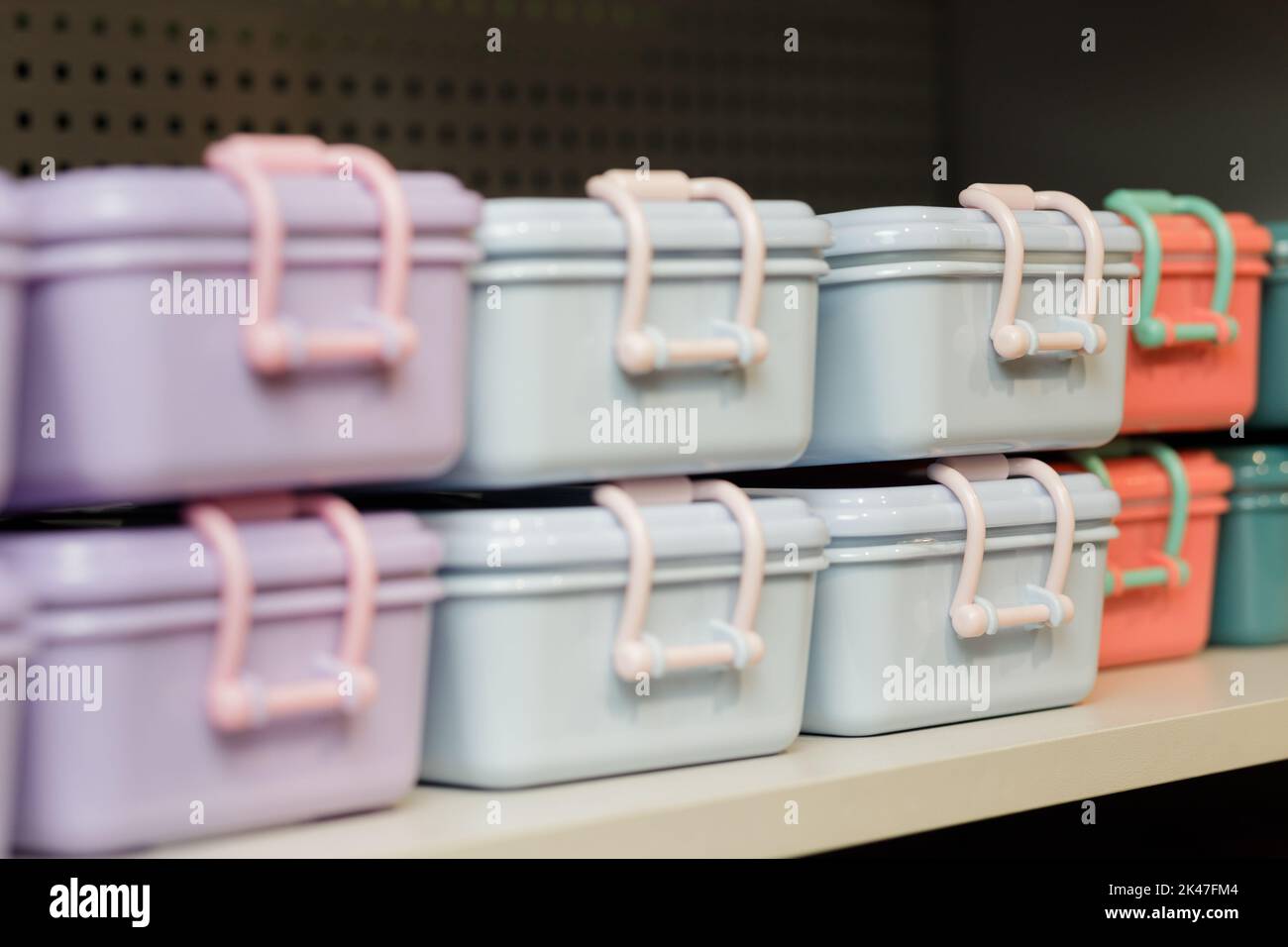 Colorful lunch boxes in the store Stock Photo - Alamy