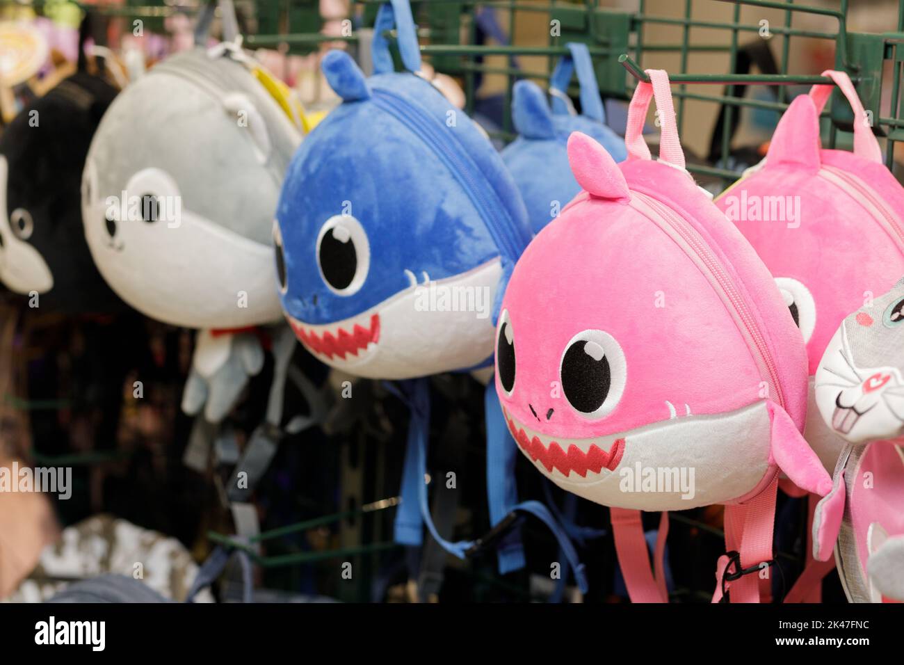 Children's backpacks in the shape of animals in the store Stock Photo ...