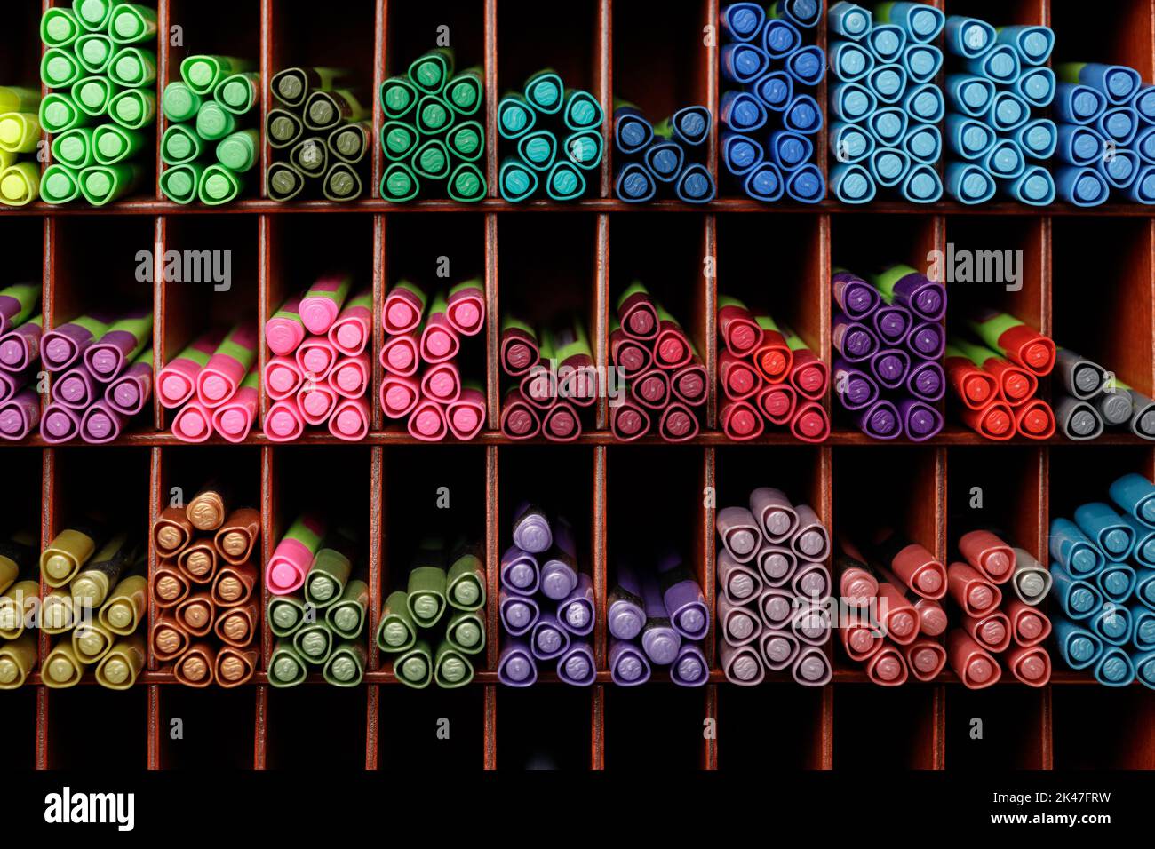 Background of different colors pens on store shelves. Art store ...