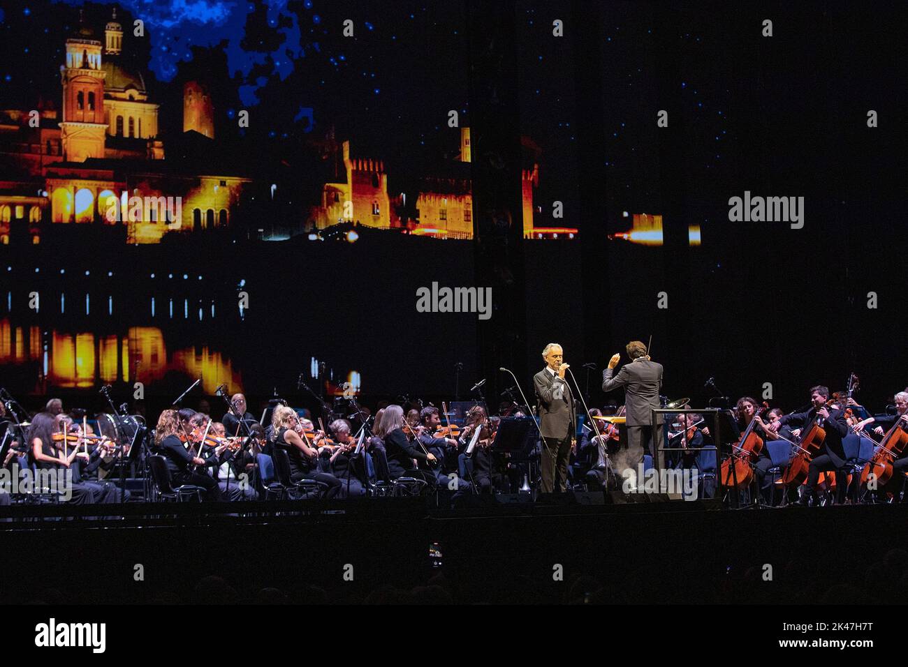 Italian tenor Andrea Bocelli (centre) performs at the O2 Arena ...