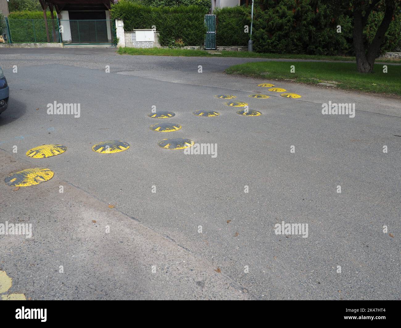 Flat circular metal speed bumps (traffic thresholds, speed breakers ...