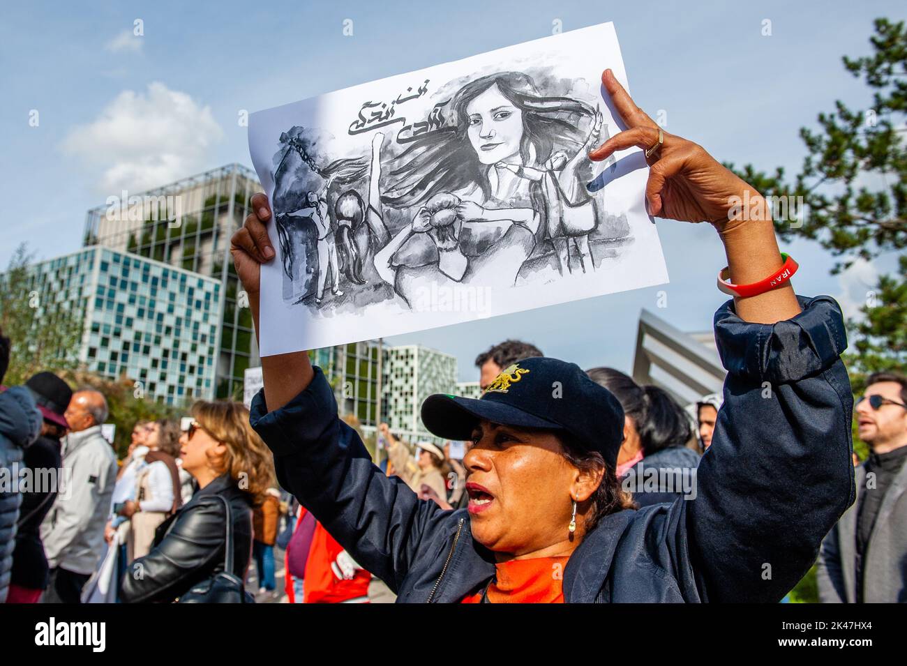 The Hague, Netherlands. 30th Sep, 2022. A woman is seen holding a ...