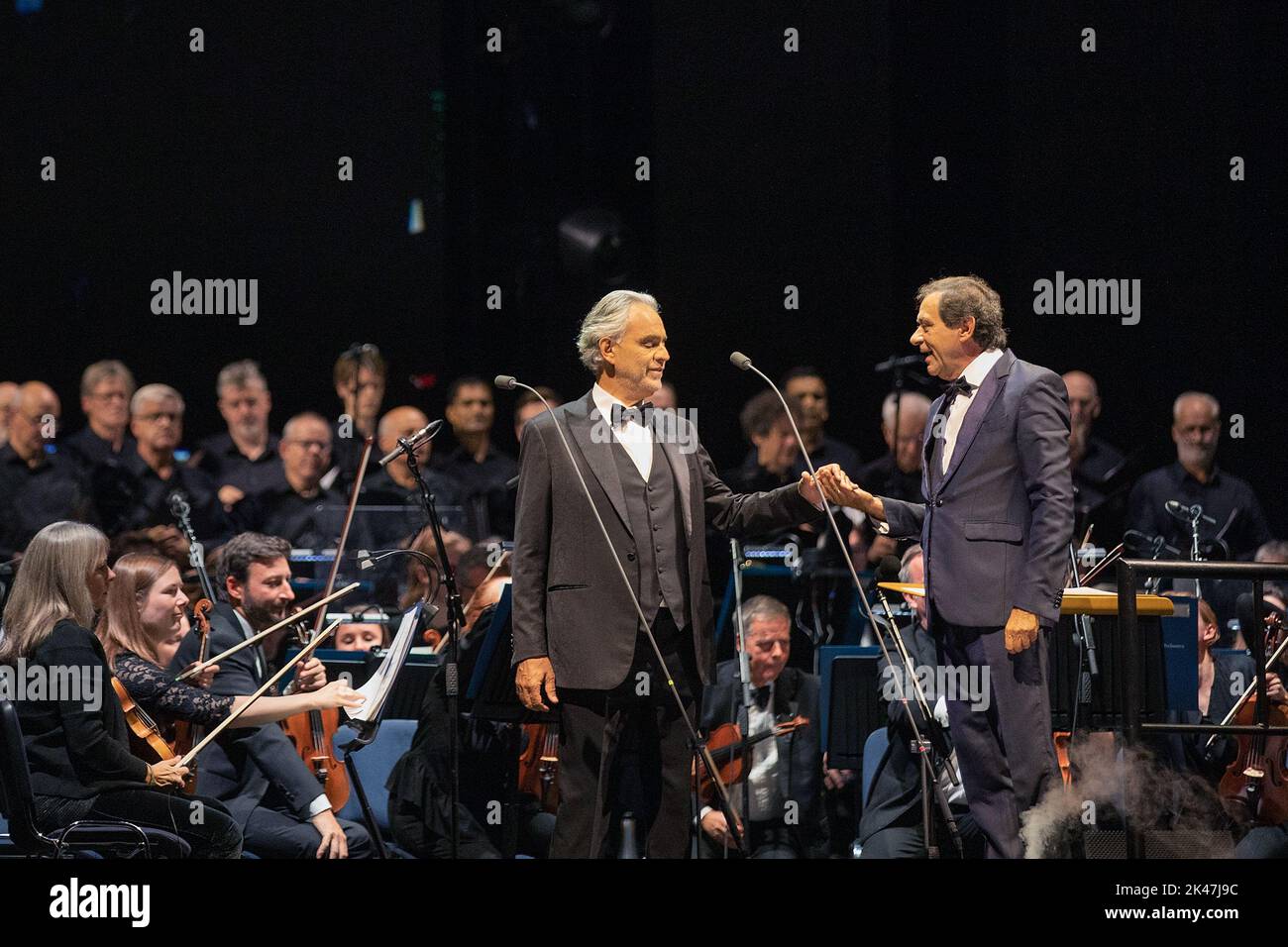 Italian tenor Andrea Bocelli (centre) performs at the O2 Arena ...