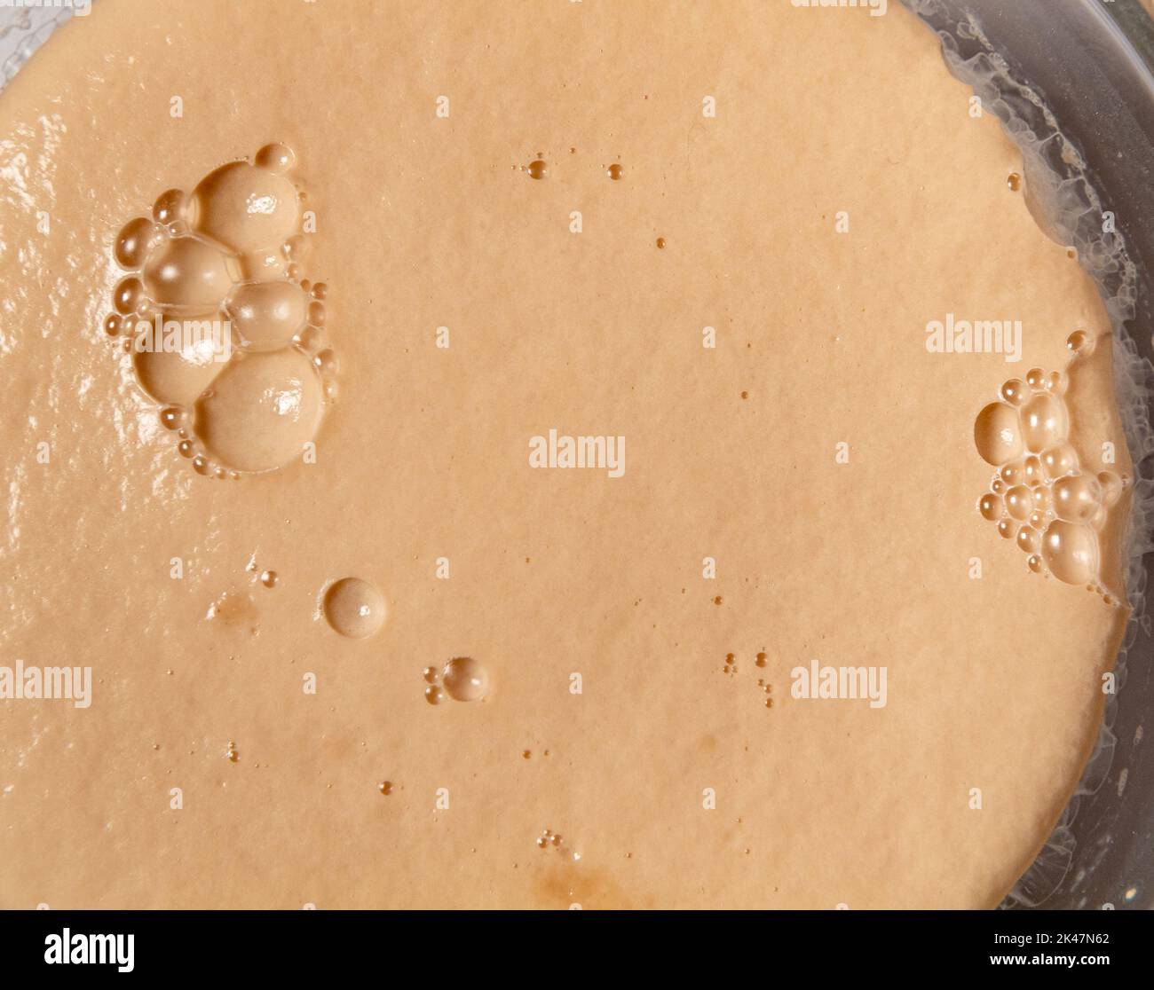 fermenting bread yeast from above close up bubbles Stock Photo - Alamy