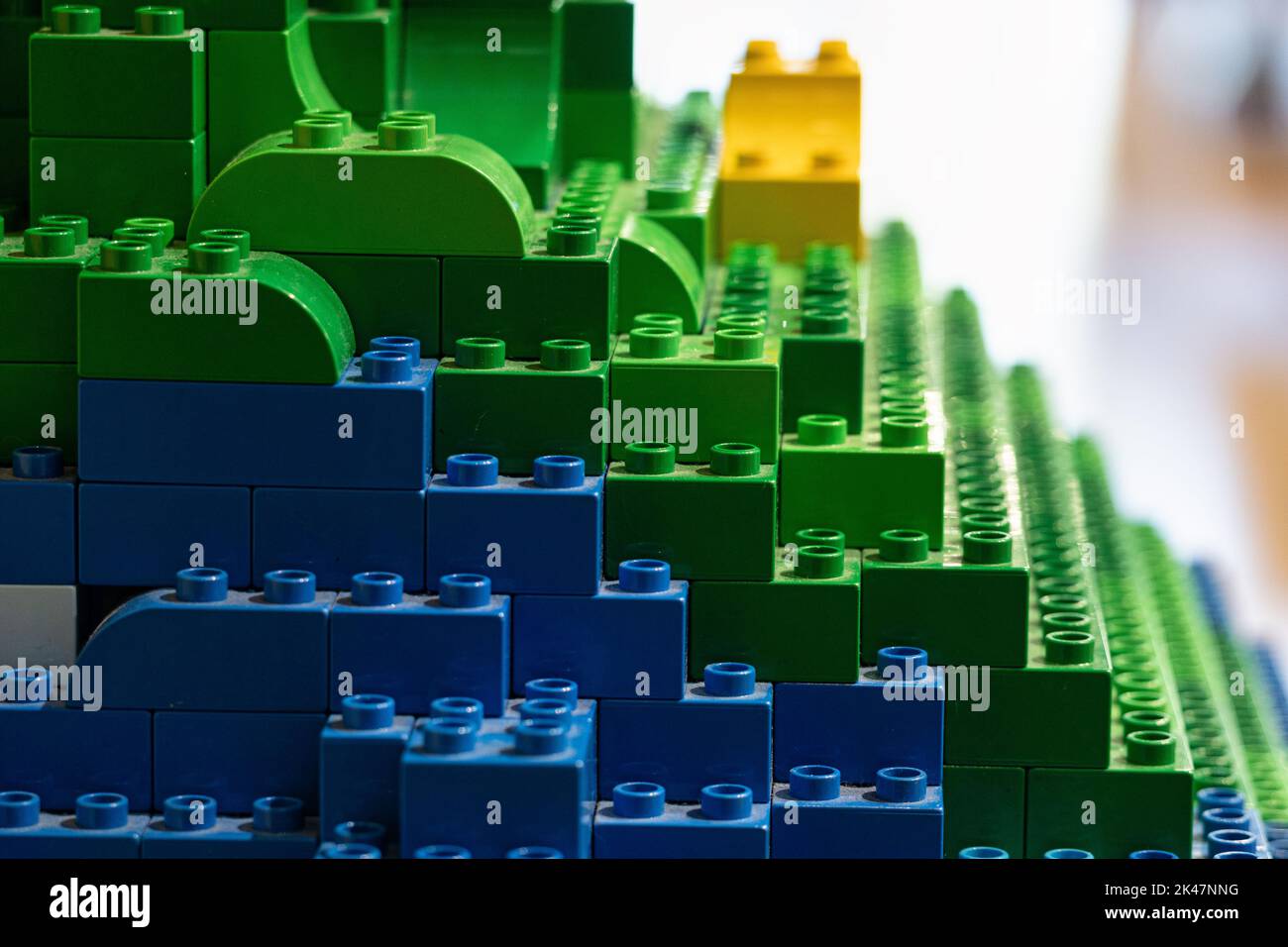 colorful LEGO blocks in blue and green Stock Photo - Alamy