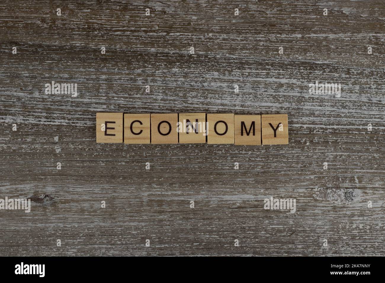 Economy spelled out in wooden letters, economy wooden words typography ...