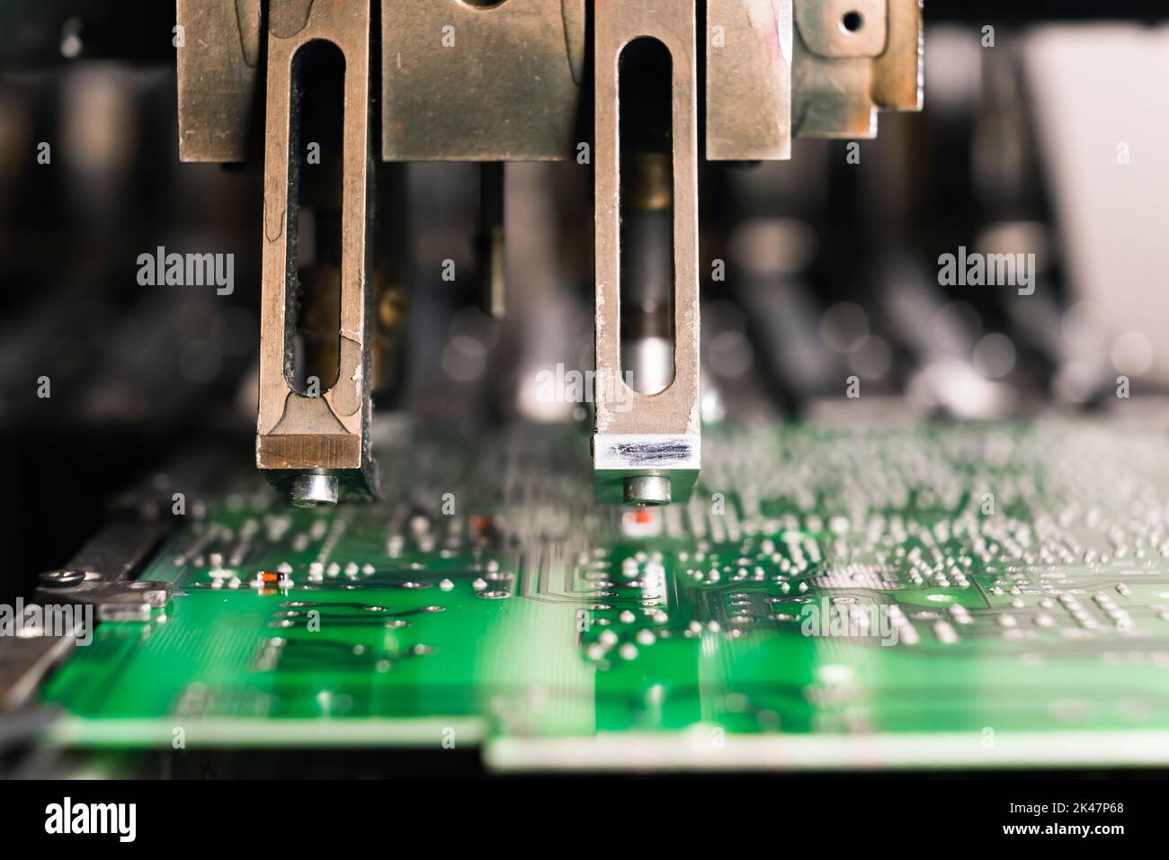 Close Up Shot Of Smd Surface Mount Device Working On Printed Circuit