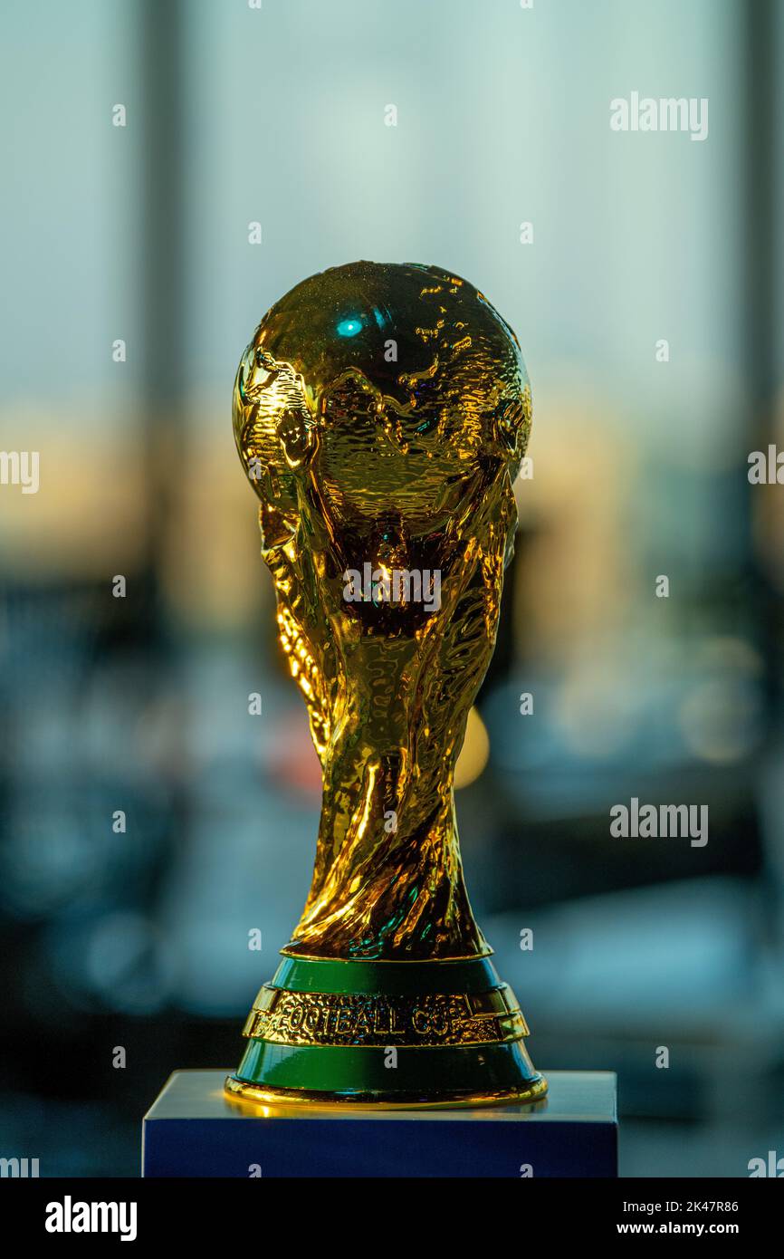 Replica of FIFA world cup football trophy Qatar 2022 Stock Photo - Alamy