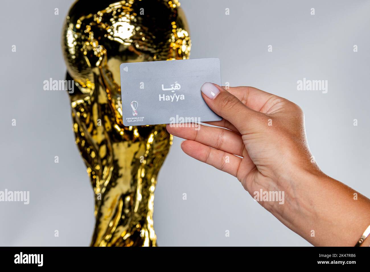 Girl Hand Holding Hayya Card for FIFA Qatar World Cup 2022 Stock Photo ...