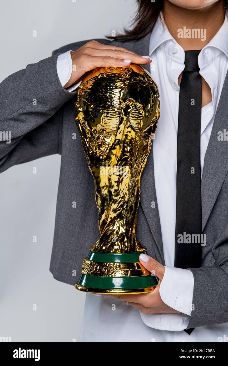 Girl holding trophy hi-res stock photography and images - Alamy