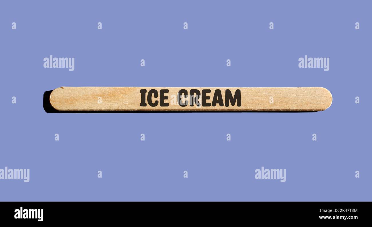 Ice cream stick with word Ice Cream isolated on blue background Stock ...