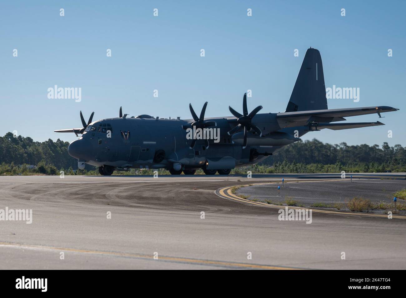 A U.S. Air Force AC-130J Ghostrider gunship lands on the flight line ...