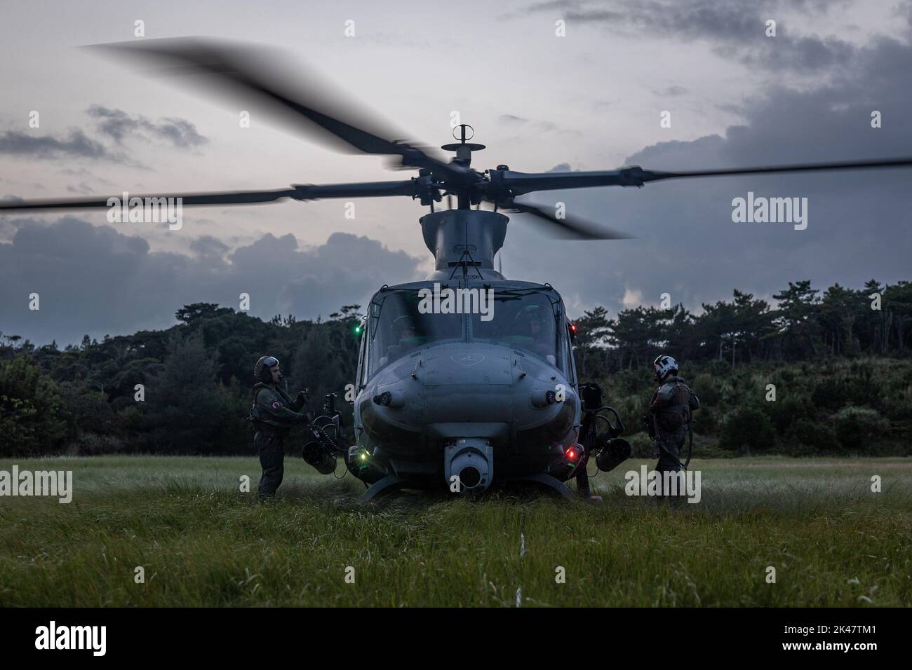 U.S. Marine Corps UH-1Y Venom helicopter crew chiefs with Marine Light ...
